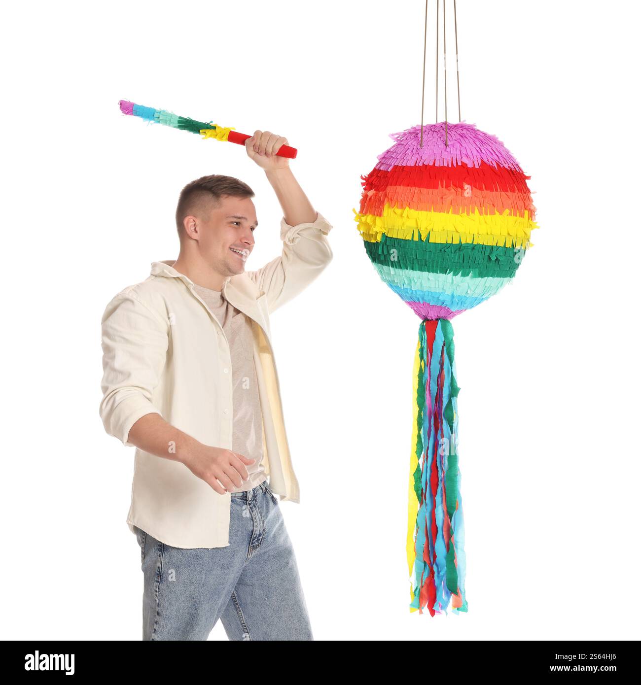 Happy man breaking pinata on white background Stock Photo - Alamy