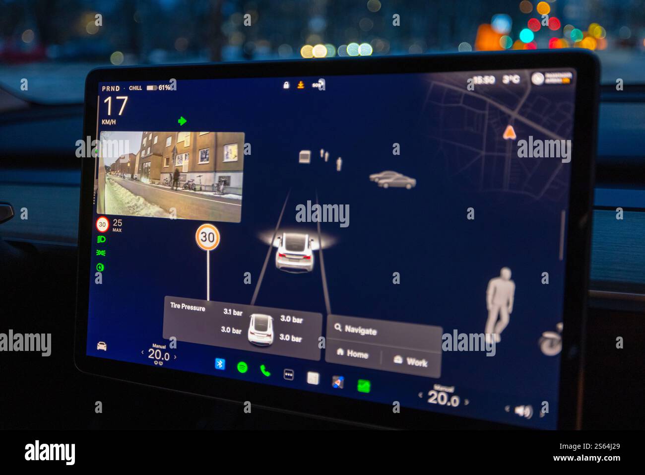 Tesla Model Y central screen displaying rear camera and surrounding ...