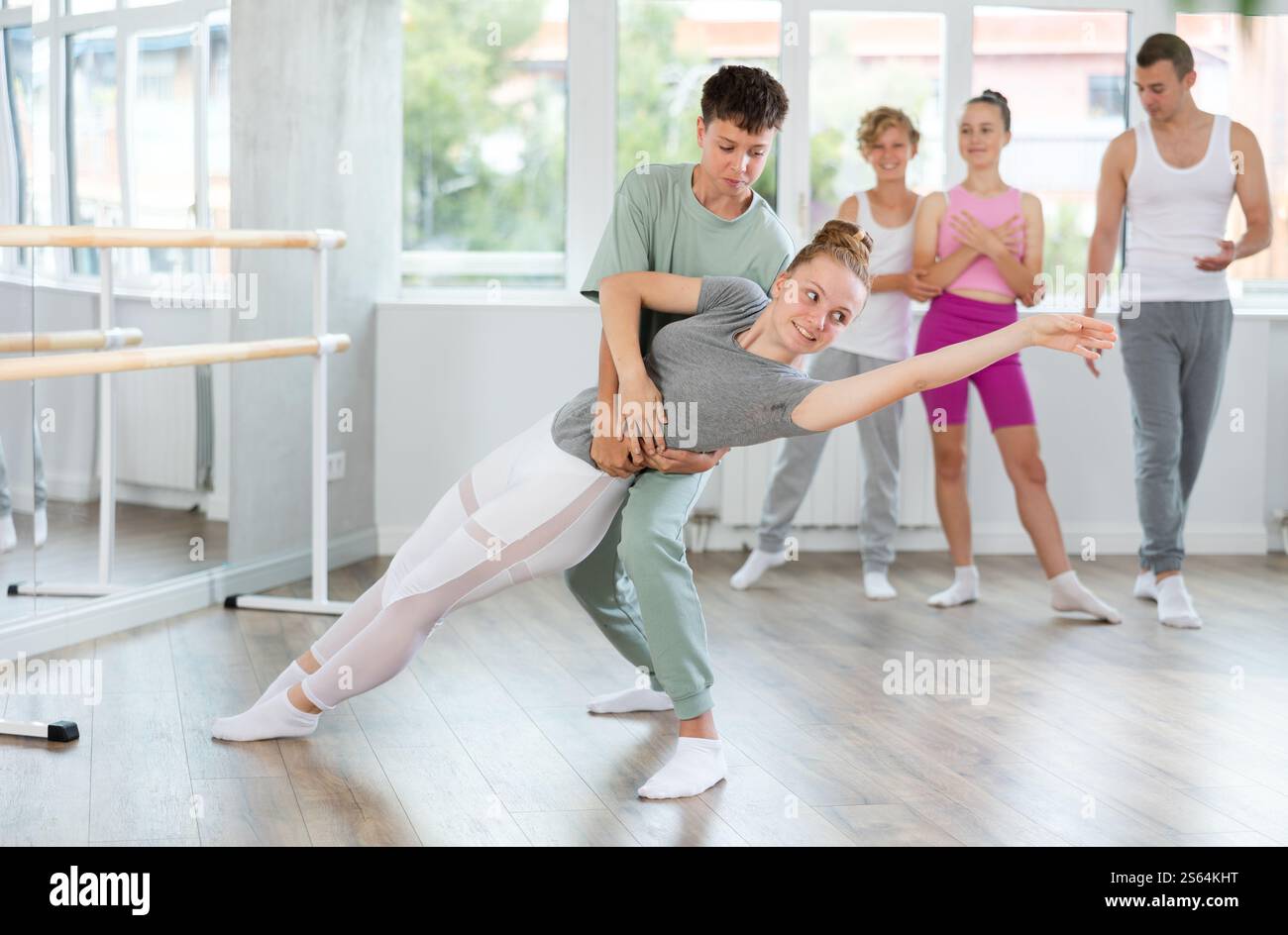 Boy and girl in pair train to perform ballet dance during rehearsal in ...
