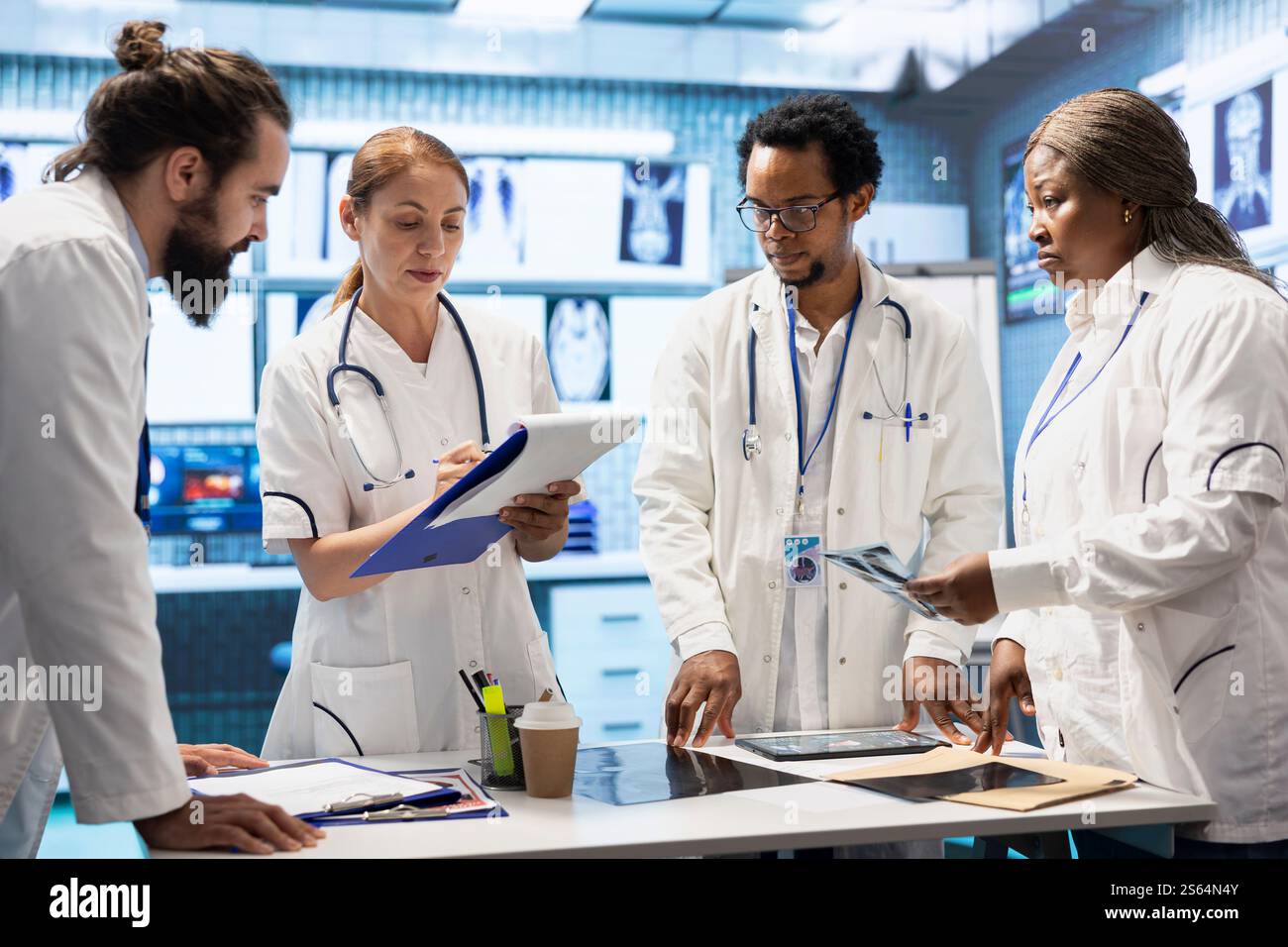 Expert physicians comparing test results and hospital records in ...