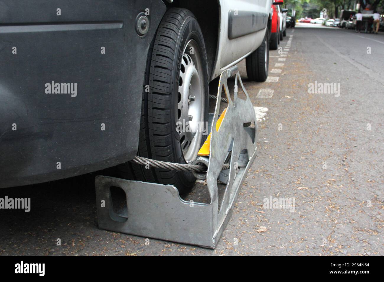 Wheel immobilizer device used by police and traffic officers to ...