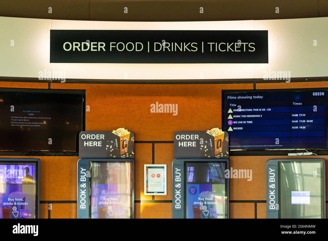 Odeon Cinema lobby with automated kiosks machines for ordering tickets ...