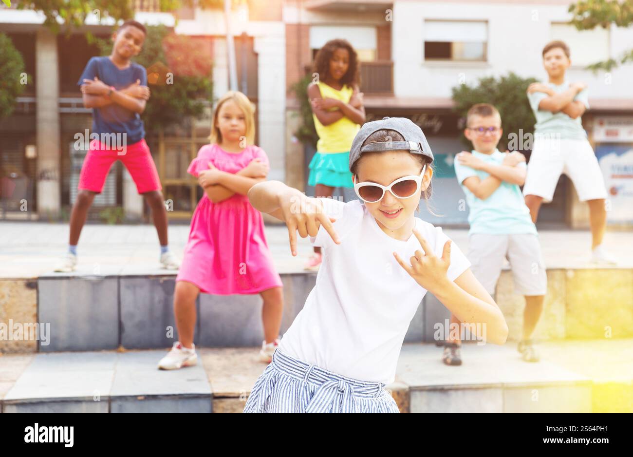 Children exercising contemporary dance moves outdoors Stock Photo - Alamy