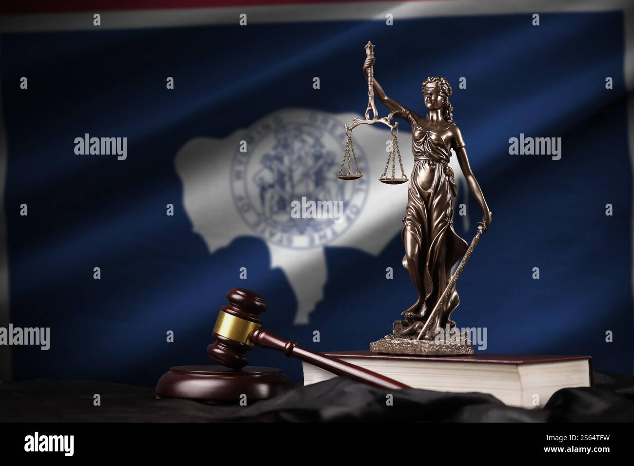 Wyoming us state flag with statue of lady justice hi-res stock ...