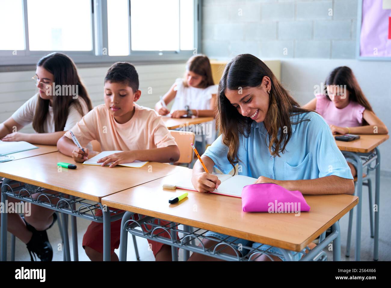 Happy Caucasian girl primary school student doing teacher lesson ...