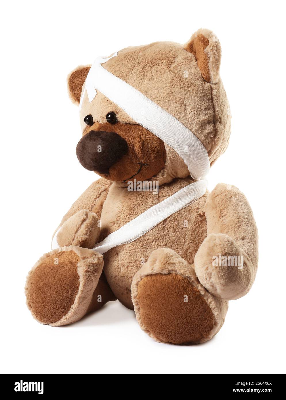 Teddy bear with bandages and adhesive medical plasters isolated on ...