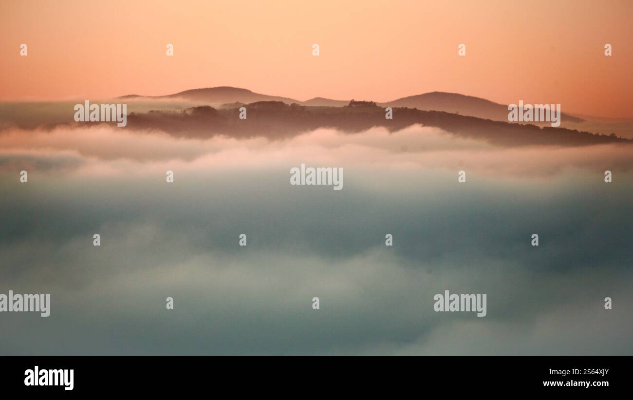 Cloud inversion and mist Stock Photo - Alamy