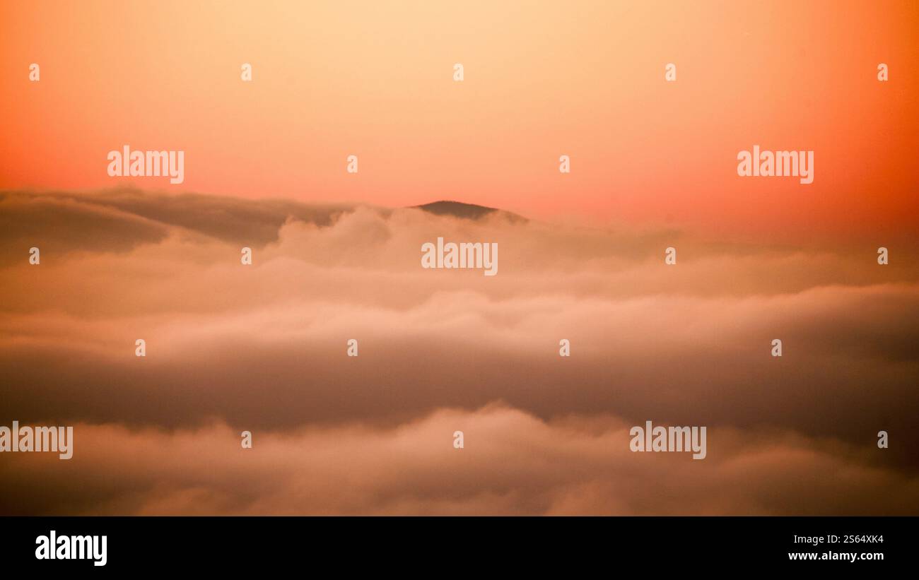 Cloud inversion and mist Stock Photo - Alamy