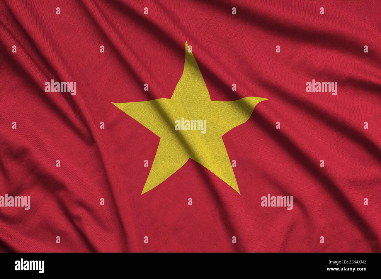 Vietnam flag is depicted on a sports cloth fabric with many folds ...