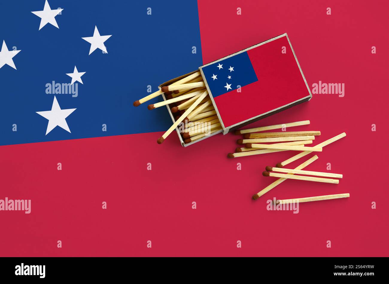 Samoa flag is shown on an open matchbox, from which several matches ...