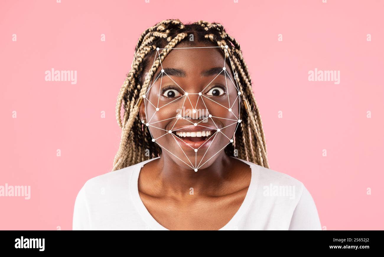 Excitement of facial recognition technology demonstrated on a smiling ...