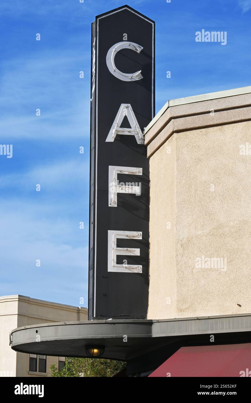 SANTA ANA, CALIFORNIA - 27 OCT 2024: Cafe Sign atop the Vault Bar and ...