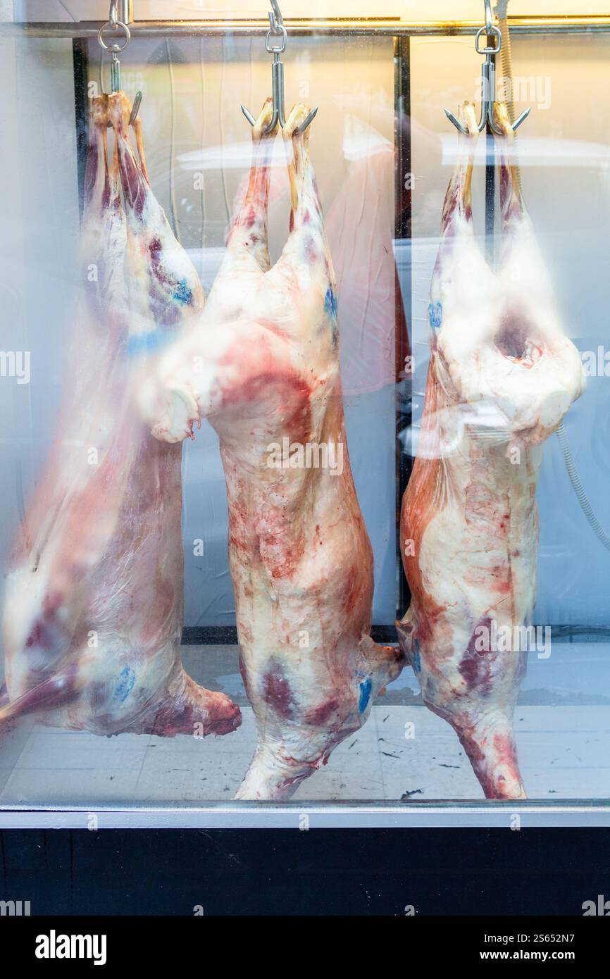 travel to Georgia - skinned lamb carcasses in window of butcher shop in ...