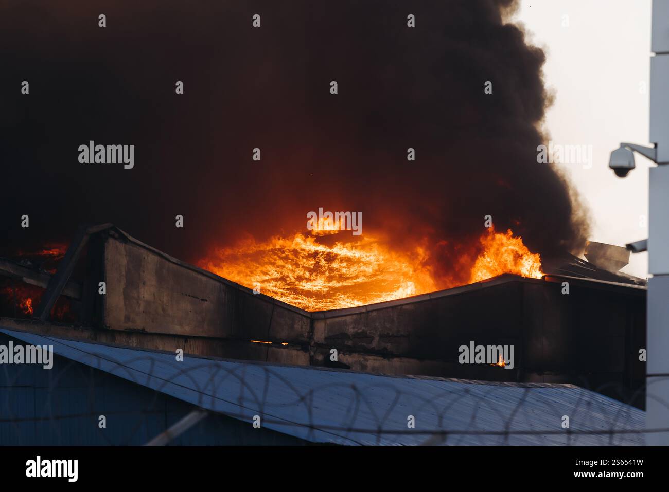 Massive large blaze fire in the city, blazing warehouse factory ...