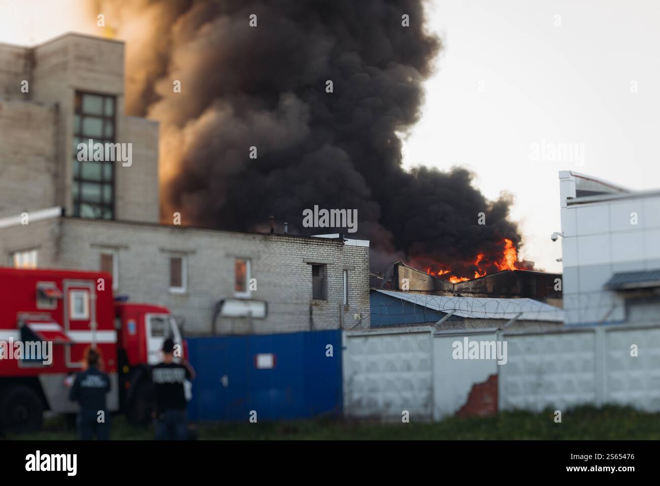 Massive large blaze fire in the city, blazing warehouse factory ...