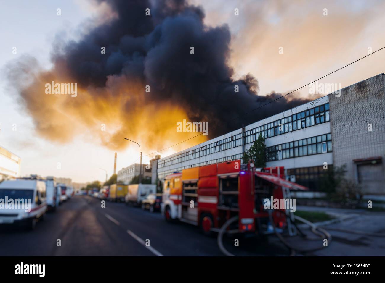 Massive large blaze fire in the city, blazing warehouse factory ...