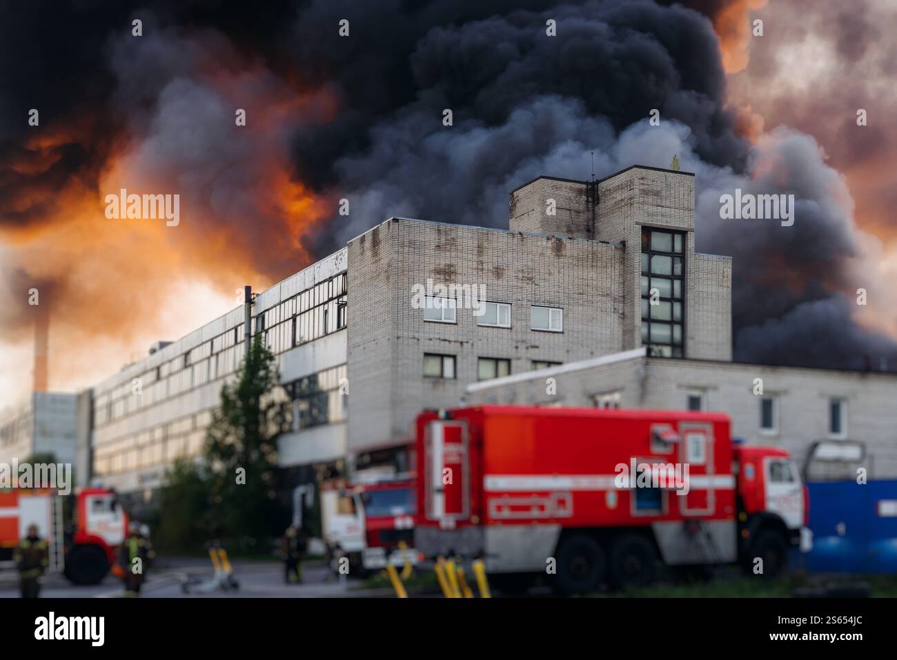 Massive large blaze fire in the city, blazing warehouse factory ...