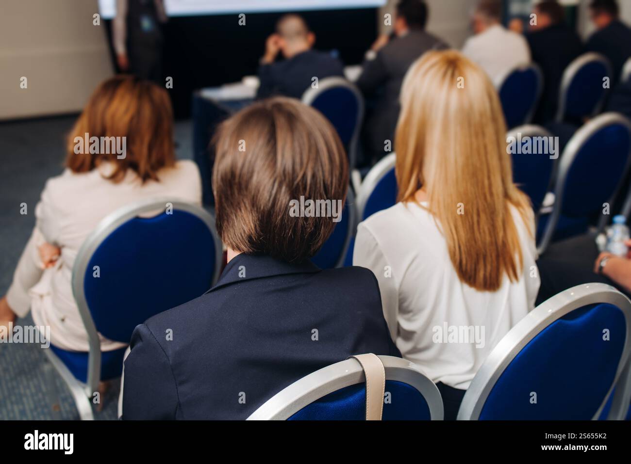 Female participants audience at the symposyum meeting, attendees in ...