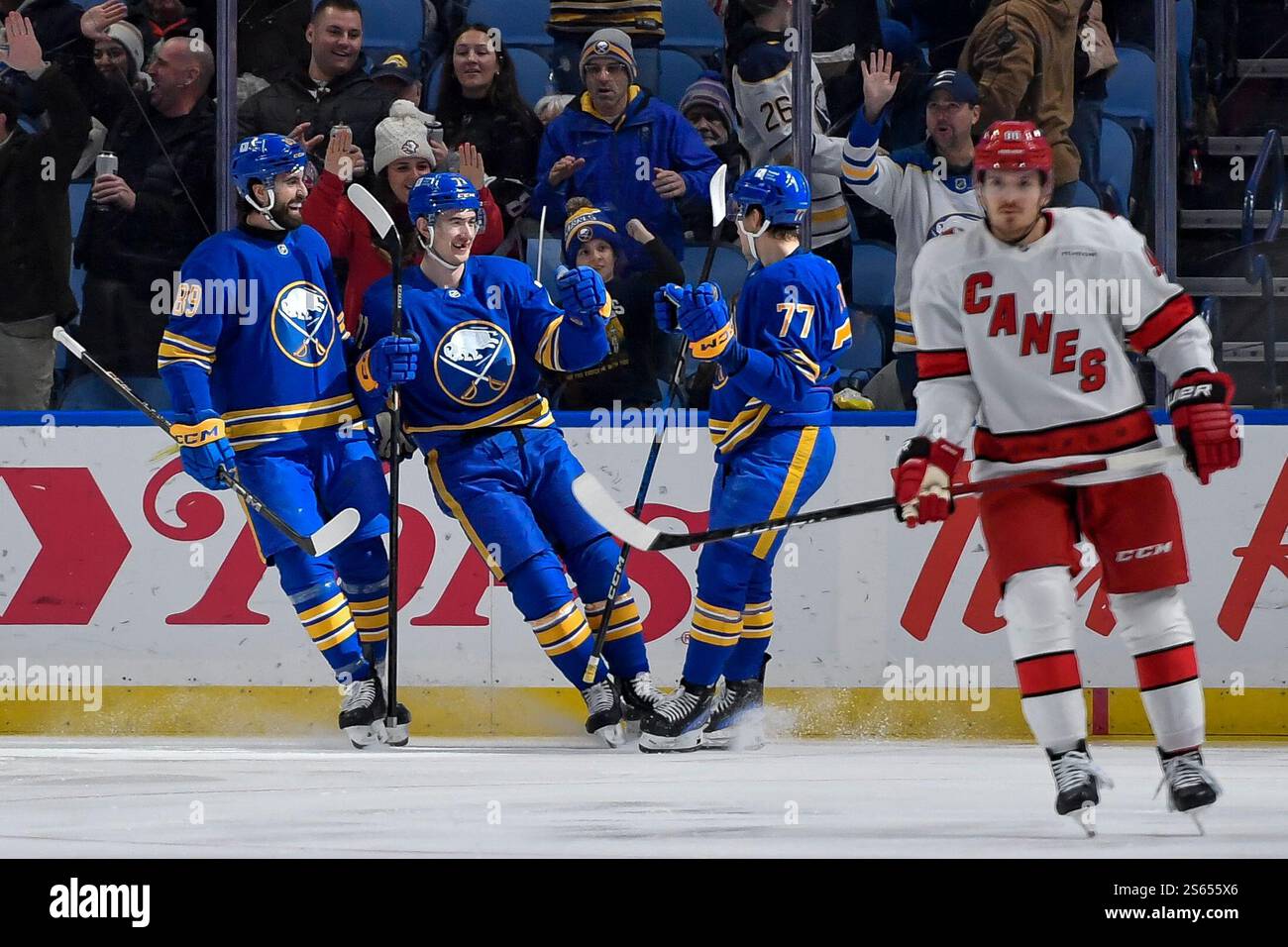 Buffalo Sabres center Ryan McLeod, second from left, celebrates with ...