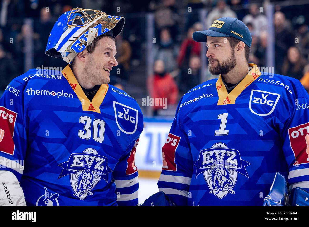 Goalkeeper Leonardo Genoni #30 (EV Zug) and goalkeeper Tim Wolf #1 (EV ...