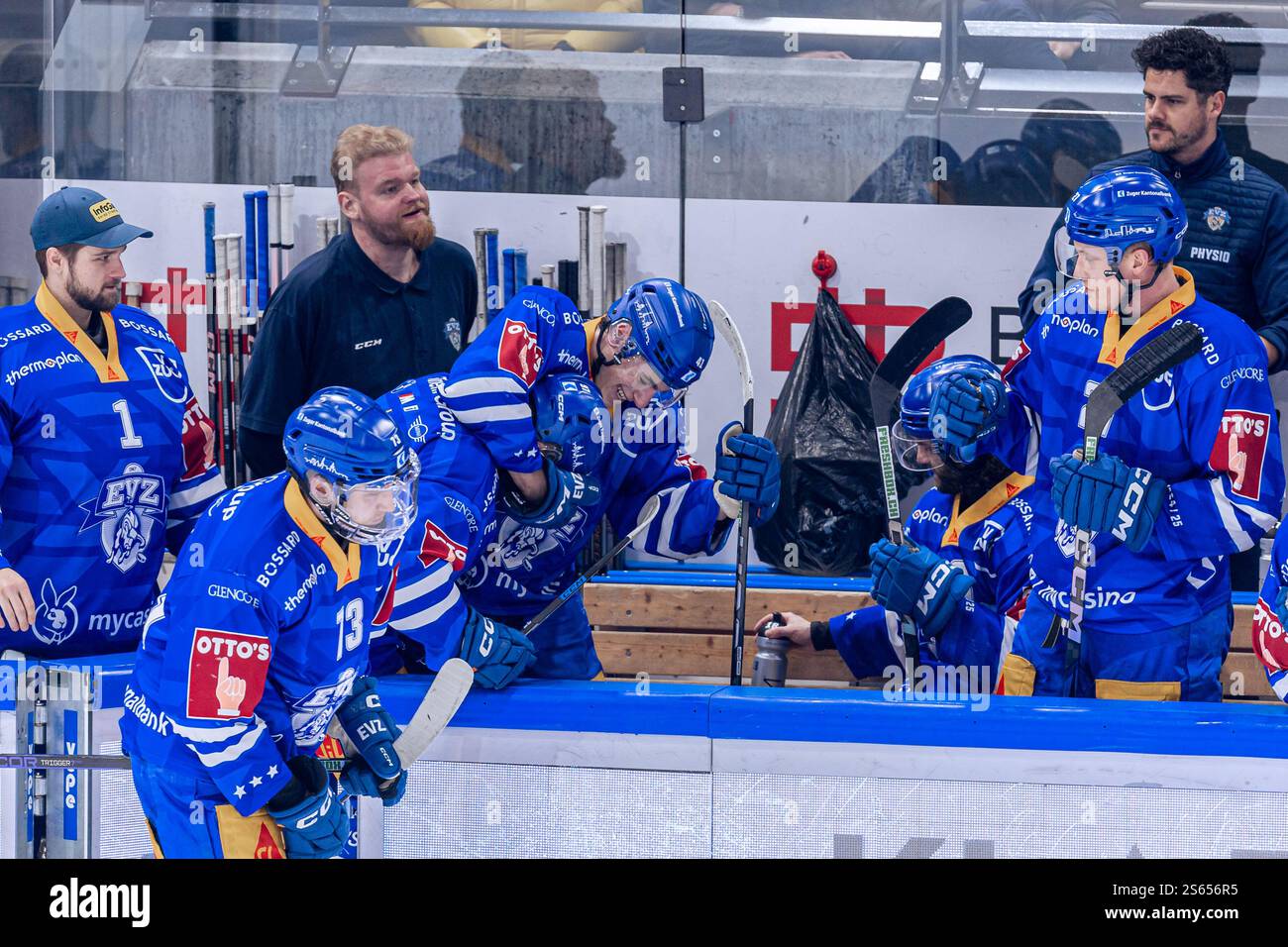Leon Muggli #41 (EV Zug) grabs goal scorer and game winner Ludvig ...