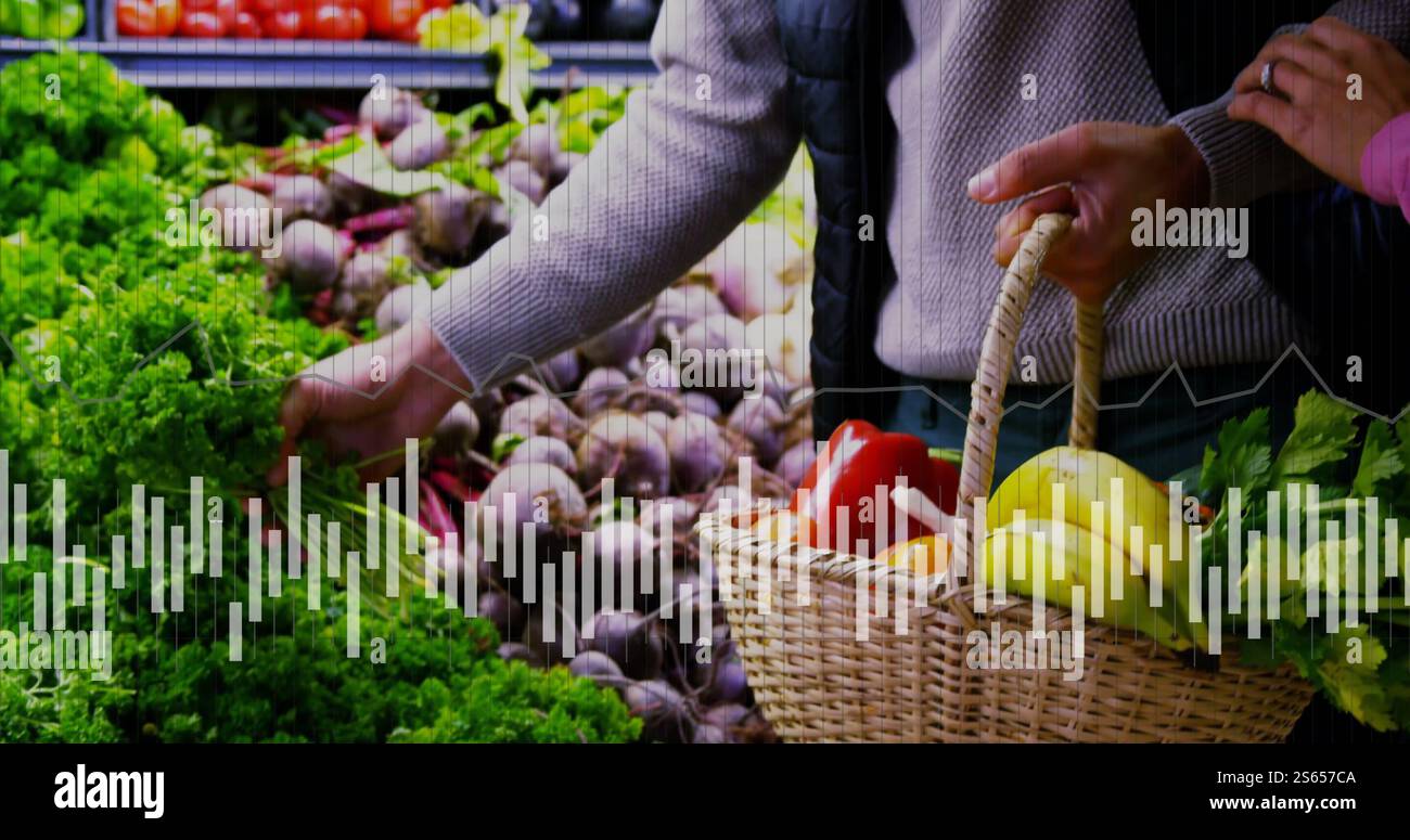 Image of data processing on diagram over caucasian man picking ...