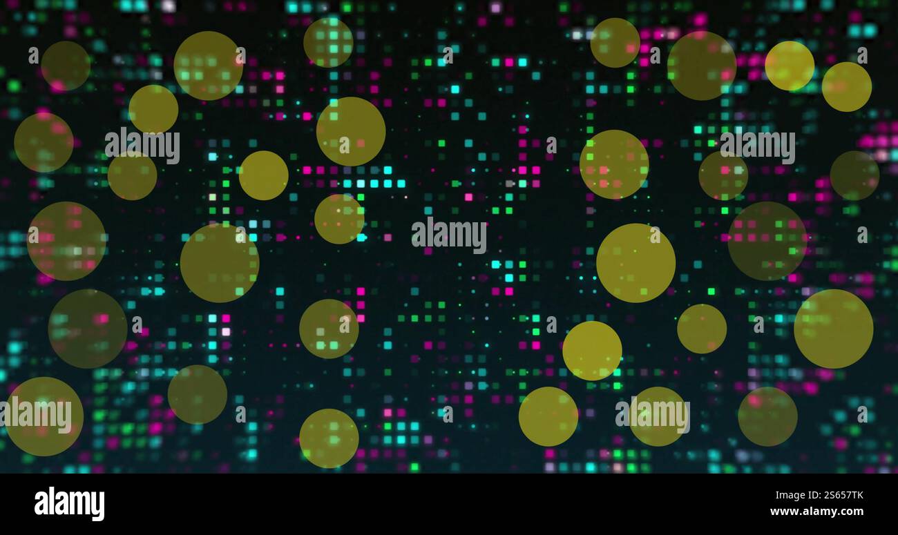 Image of yellow light spots over twinkling coloured data pixels on dark ...