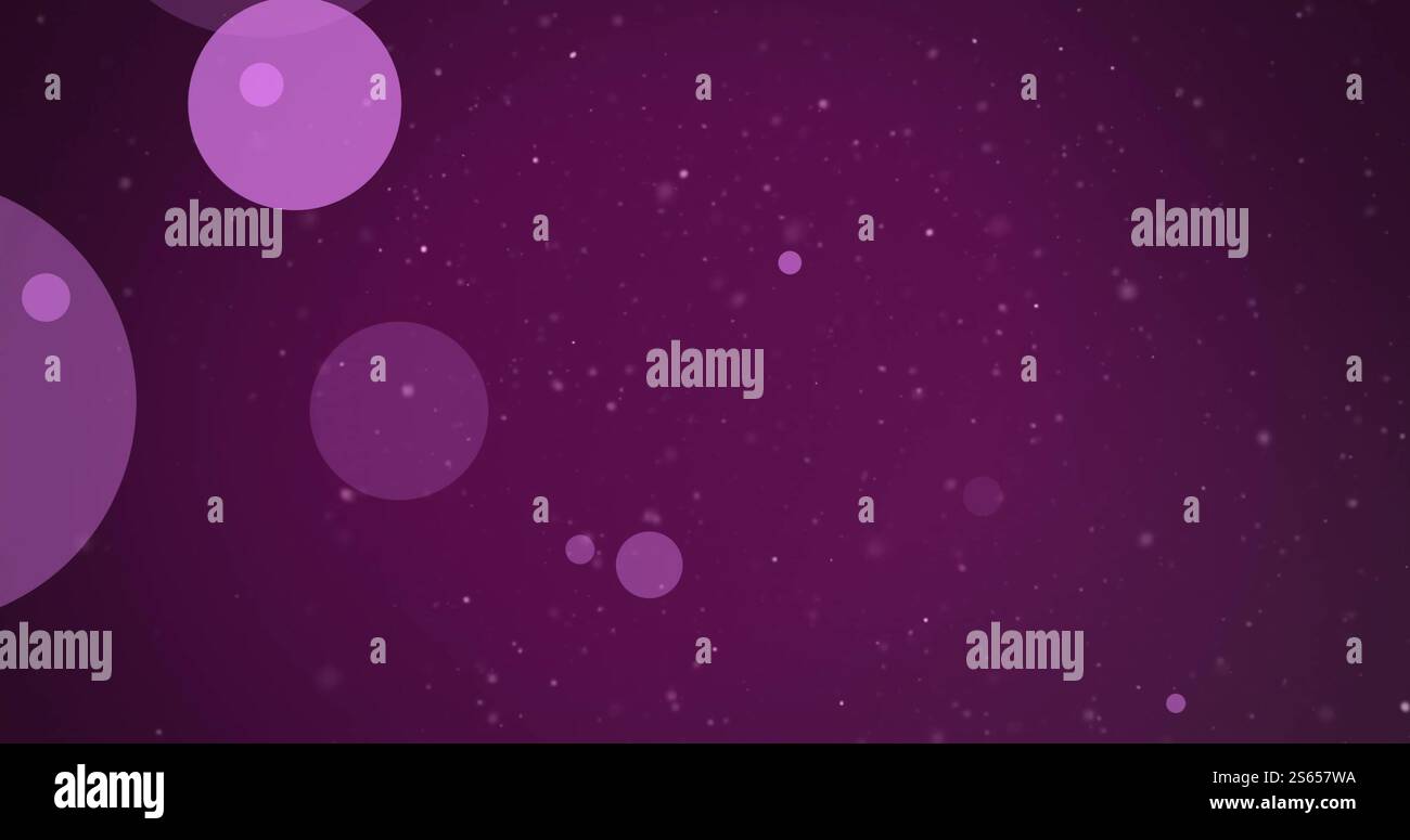 Image of purple light spots over white particles on dark purple ...