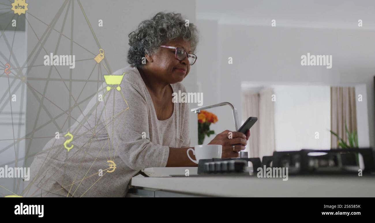 Image of network of connections with icons over senior african american ...