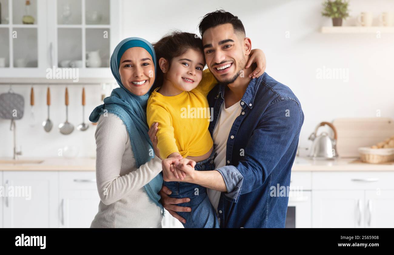 Happy Middle-Eastern Father, Mother And Little Daughter Posing Together ...