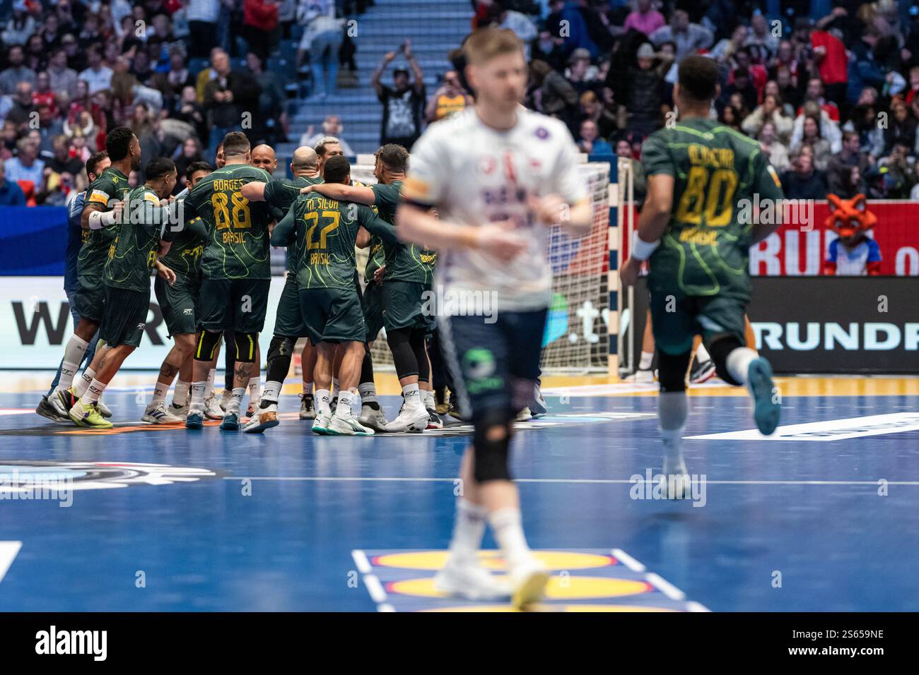 Players of, Brazil. , . celebrate after the 2025 IHF World Men's ...