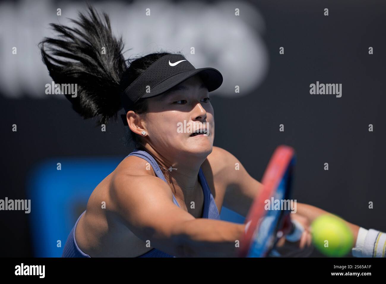 Wang Yafan of China plays a forehand return to Daria Kasatkina of ...