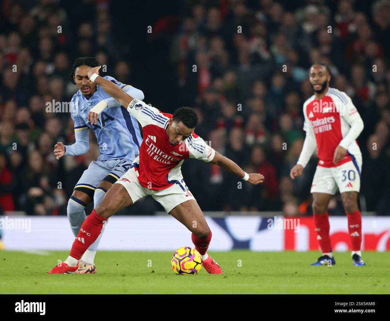 London, UK. 15th Jan, 2025. Djed Spence (TH) Jurrien Timber (A) at the ...