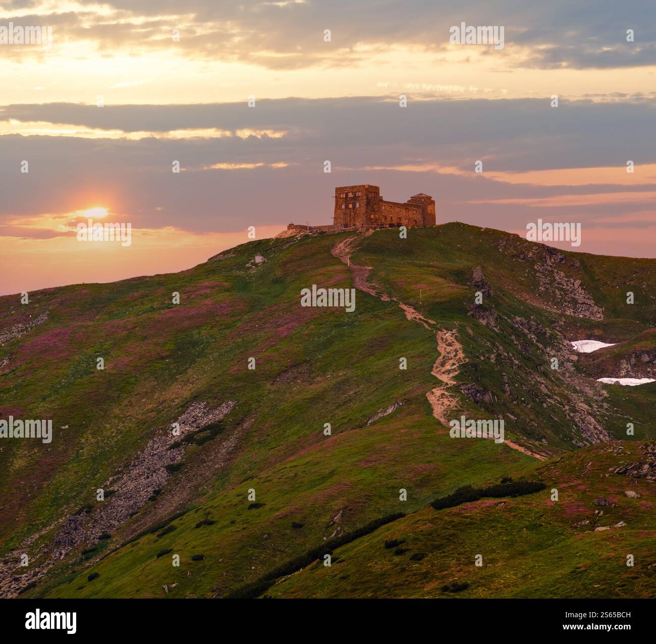 Massif of Pip Ivan with the ruins of the observatory on top. Pink ...