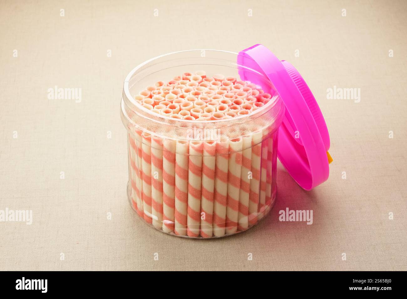 Strawberry wafer rolls or astor in white plate Stock Photo - Alamy