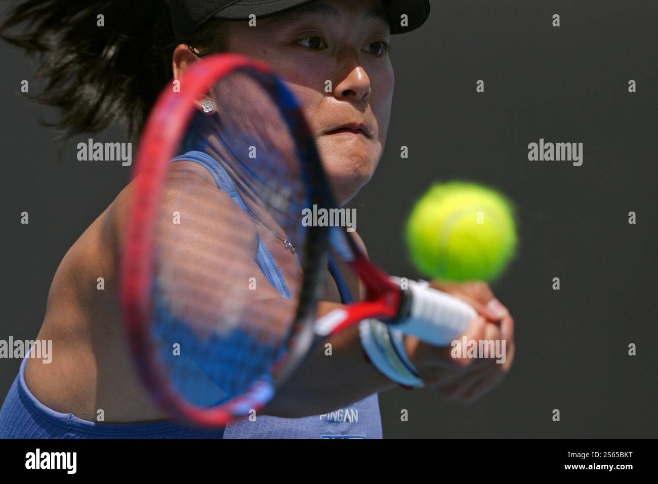 Wang Yafan of China plays a forehand return to Daria Kasatkina of ...