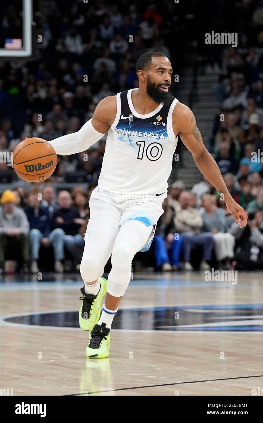 Minnesota Timberwolves guard Mike Conley (10) dribbles down the court ...