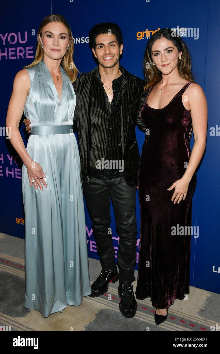 Julia Stiles, from left, Mena Massoud, and Isabelle Fuhrman attend the ...
