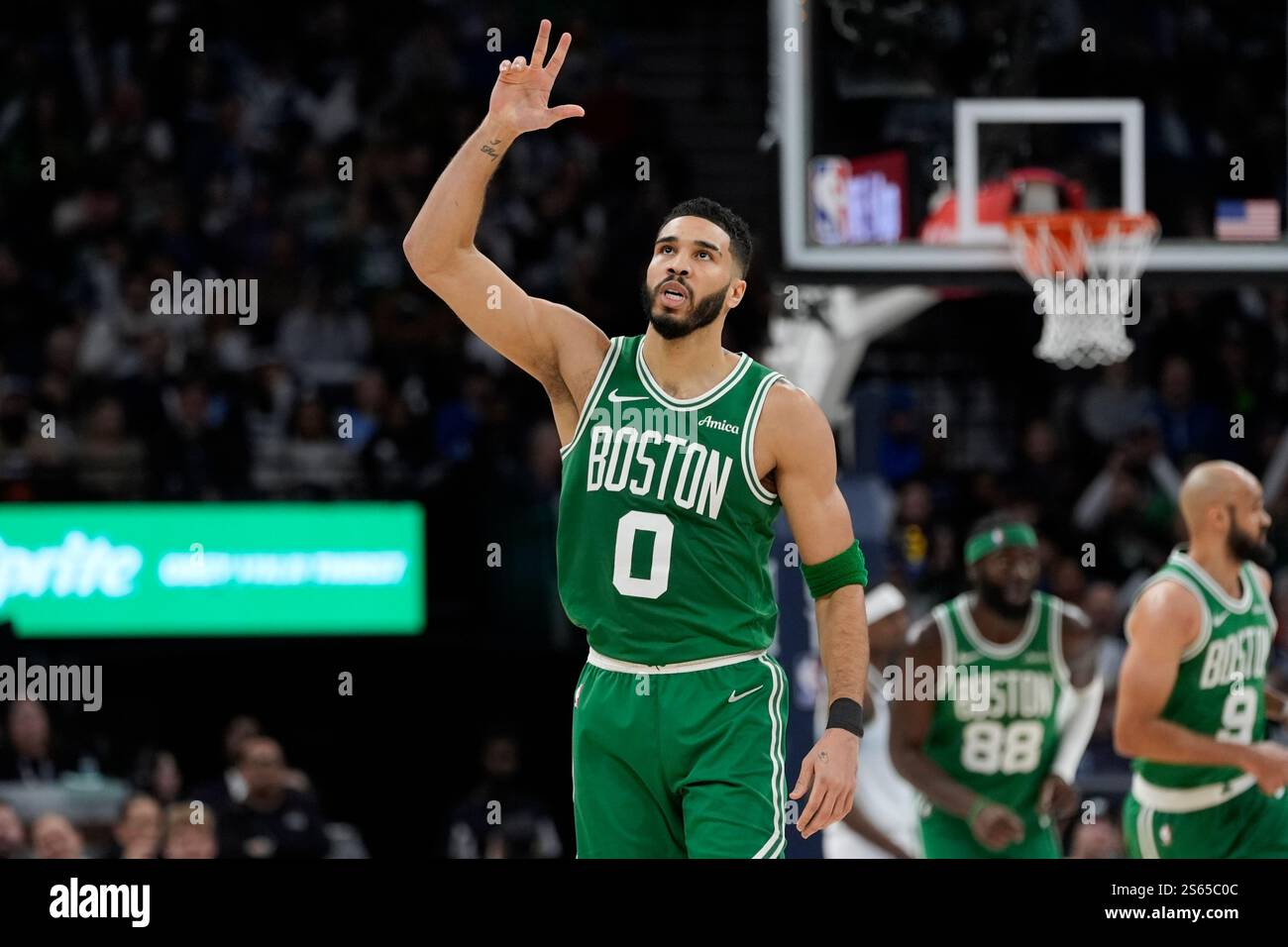 Boston Celtics forward Jayson Tatum (0) gestures after making a 3-point ...