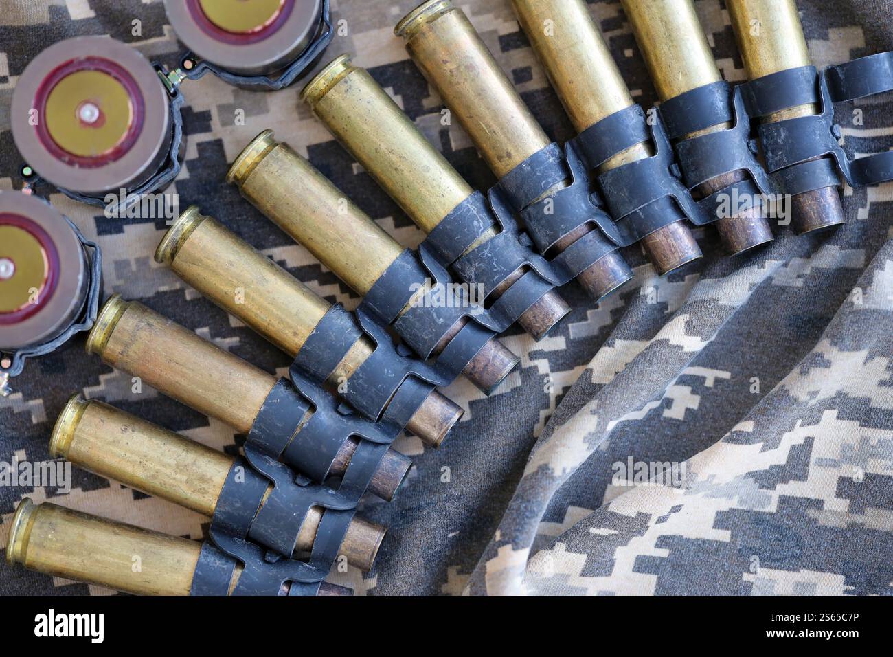 Ukrainian army fabric and machine gun belt shells lies on ukrainian ...