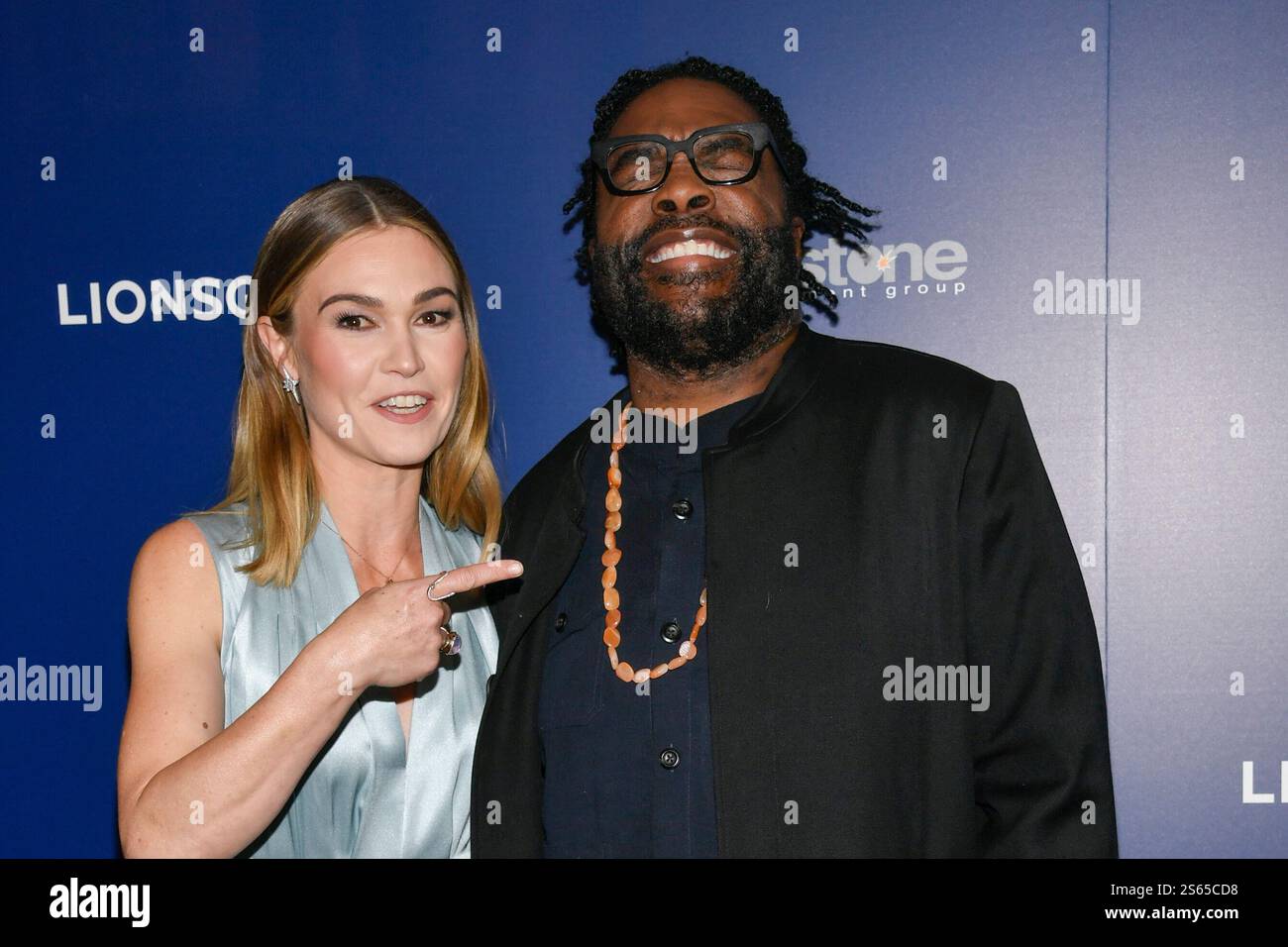 Julia Stiles, left, and Questlove attend the special screening of ...