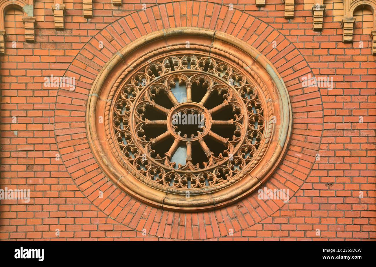 Texture front part of an ancient brick crypt with a round patterned ...