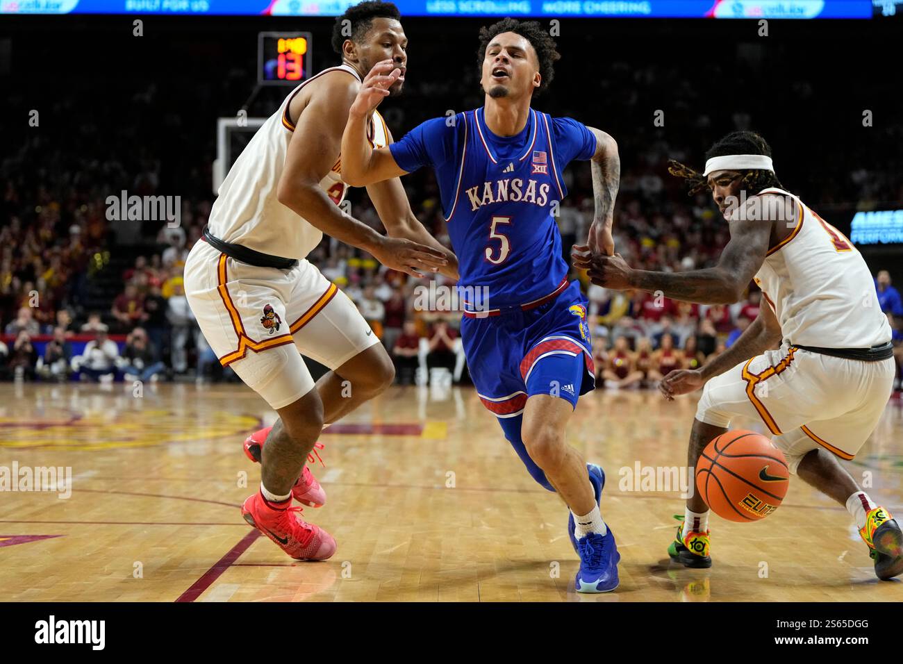 Kansas guard Zeke Mayo (5) loses control of the ball as he drives ...