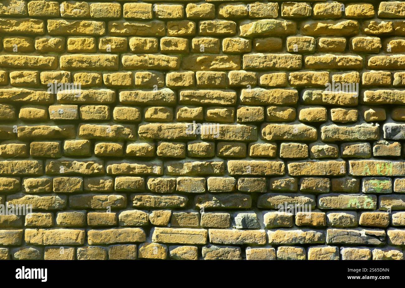 Horizontal wall texture of several rows of very old brickwork made of ...