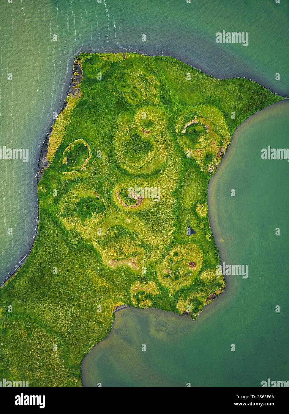 An aerial view of a unique island in Lake Mývatn, Iceland, featuring ...