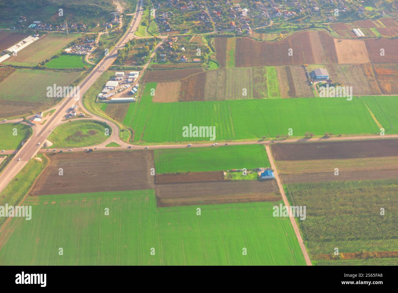 Aerial view of rural area, mix of agricultural fields, roads, small ...