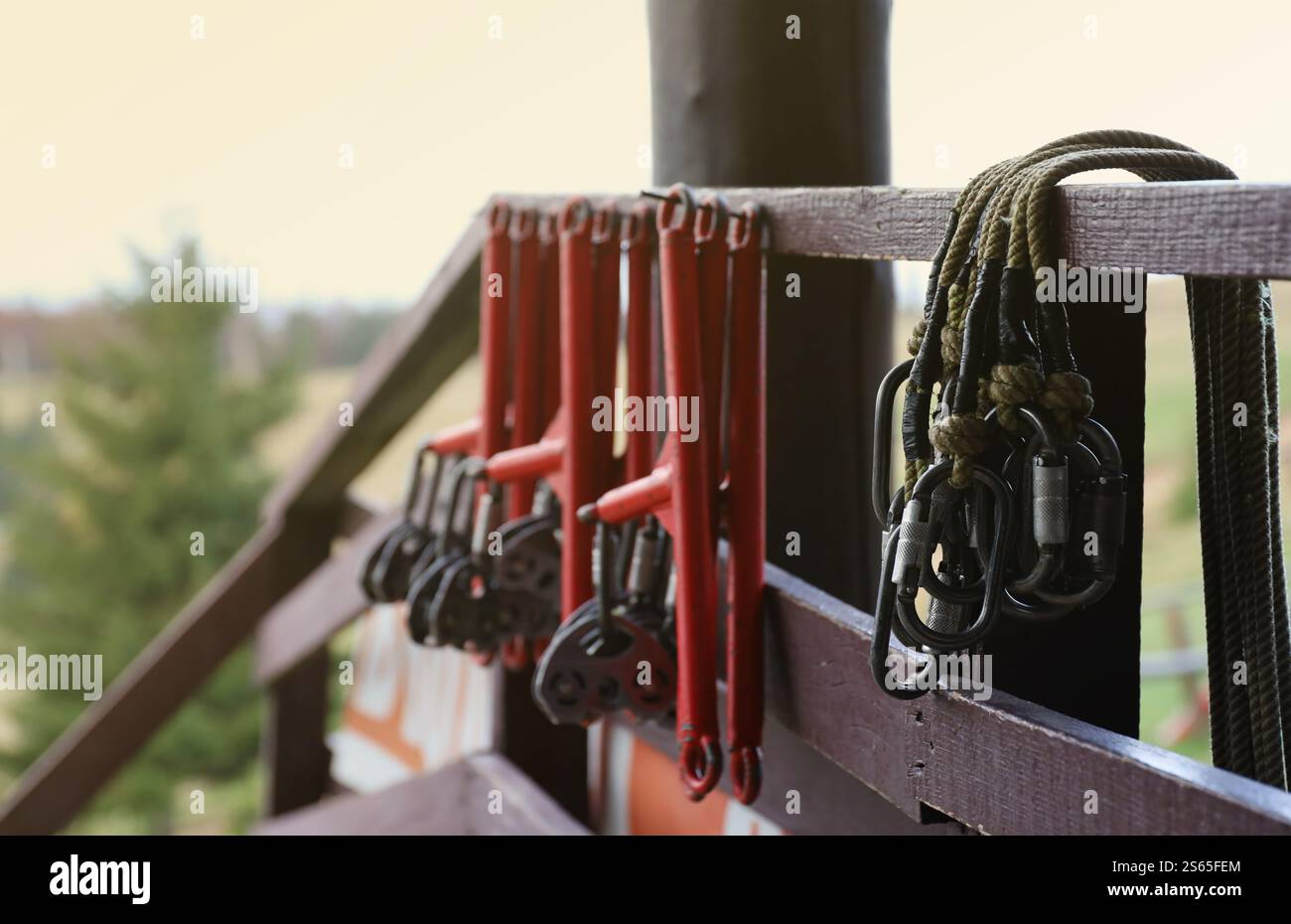 large metal locking carabiners with rope, climbing gear hanging on the ...