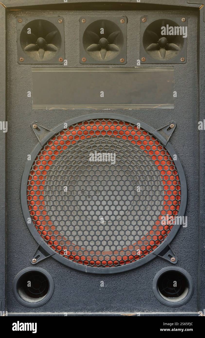 Old used audio speaker texture on dark blue background. Old used audio ...