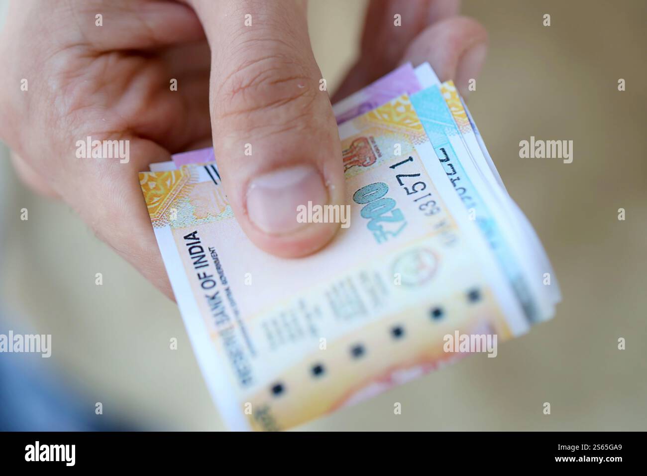 Man hand with indian rupees bills close up. Concept of financial ...