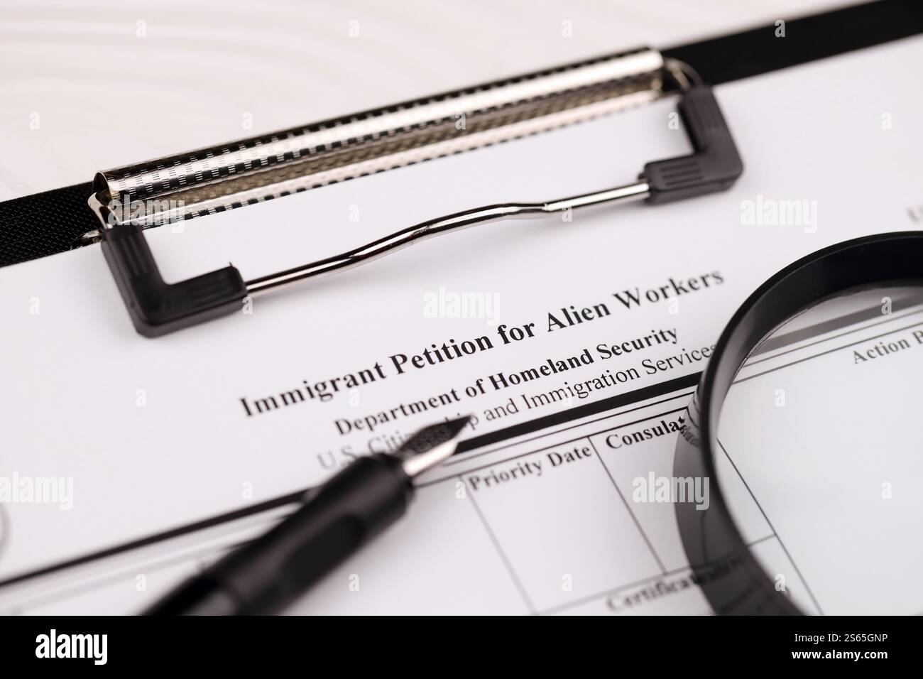 I-140 Immigrant petition for alien workers blank form on A4 tablet lies on office table with pen ...